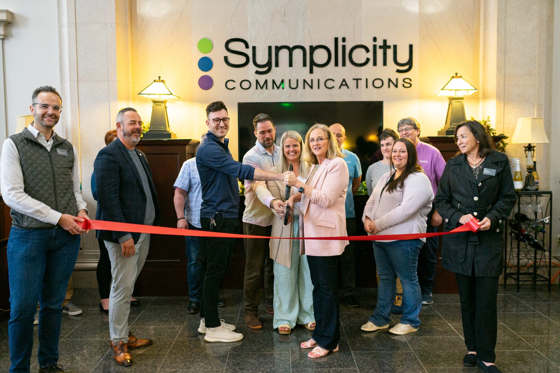 Ribbon Cutting Ceremony at Symplicity Communications Building